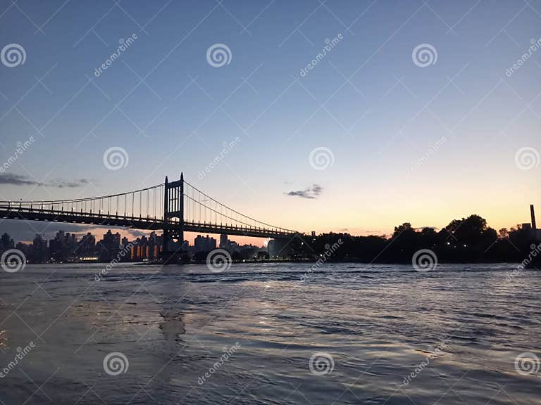 The Astoria Bridge at dusk stock image. Image of bridge - 290981421