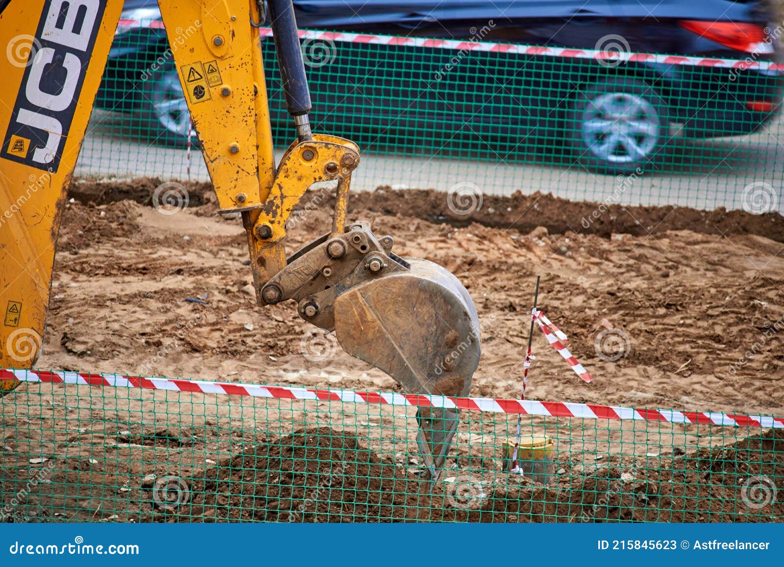 Astrakhan, Russia - 02.15.2021: JCB Backhoe Loader Bucket Digs the ...