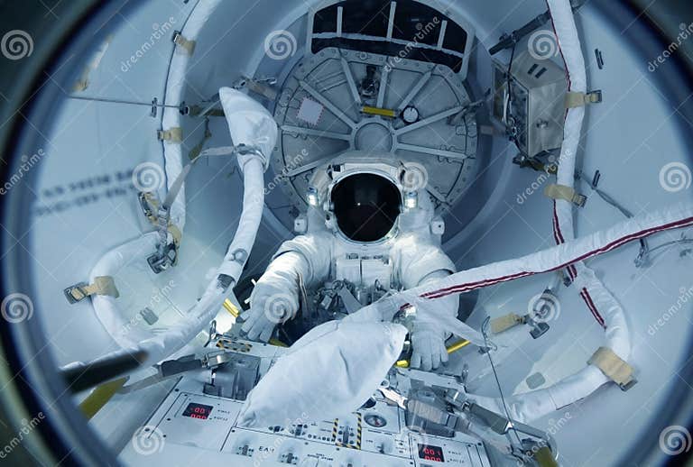 Astronaut at the Control Panel in a Space Shuttle. Elements of this ...