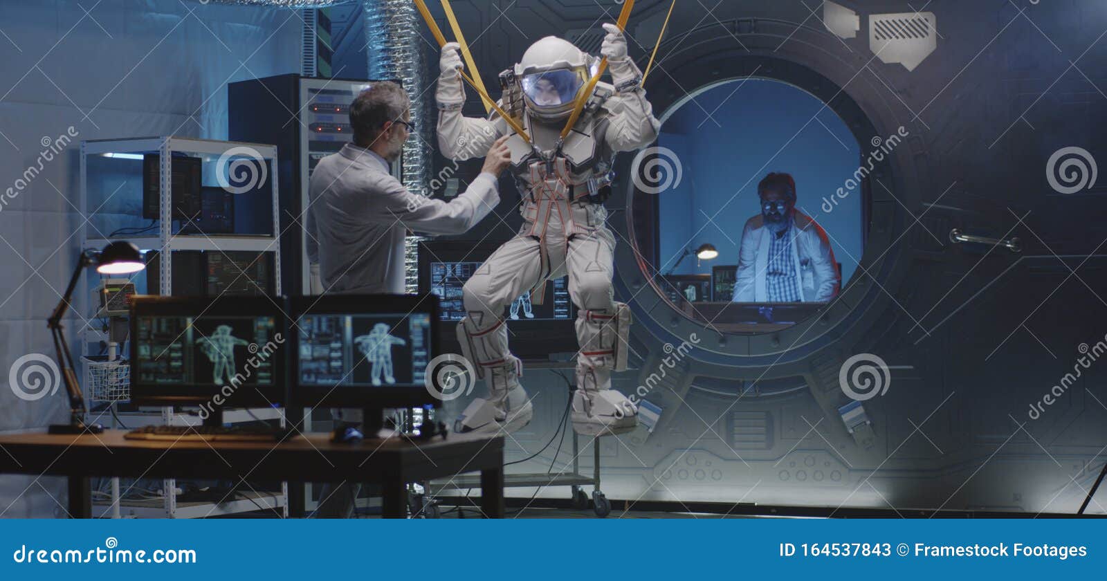 Astronaut Moving Limbs while Hanging on Bands Stock Image - Image of ...