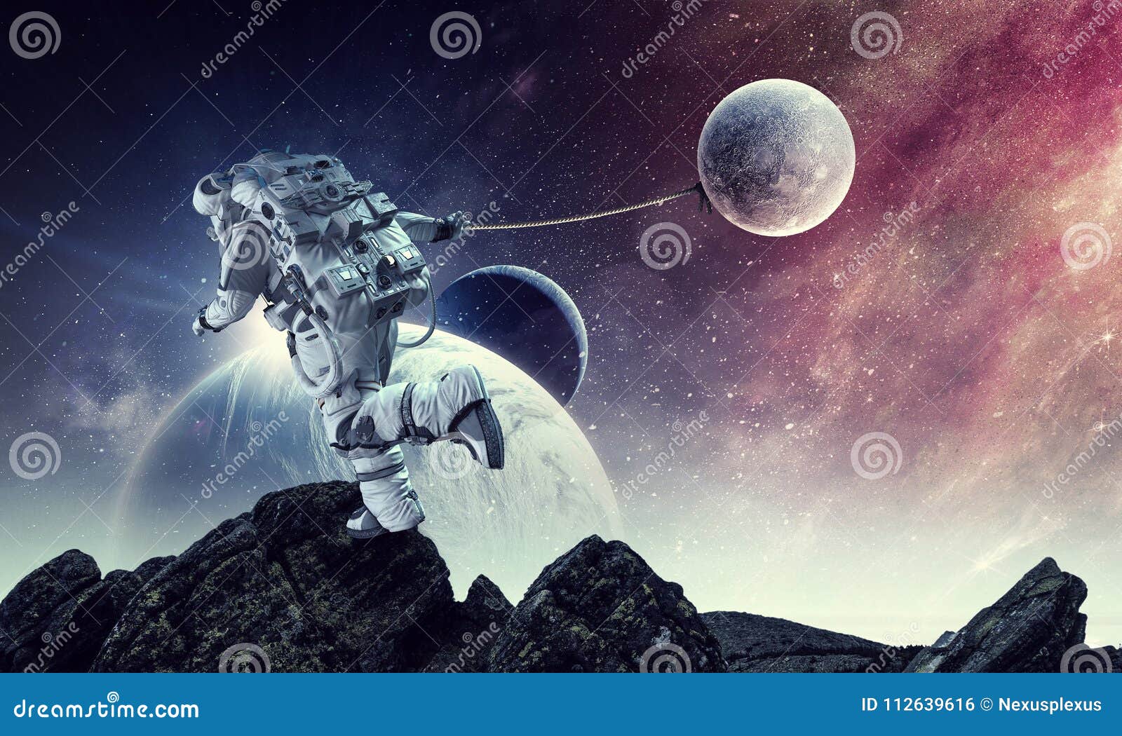 Fantasy Image with Spaceman Catch Planet. Mixed Media Stock Photo ...
