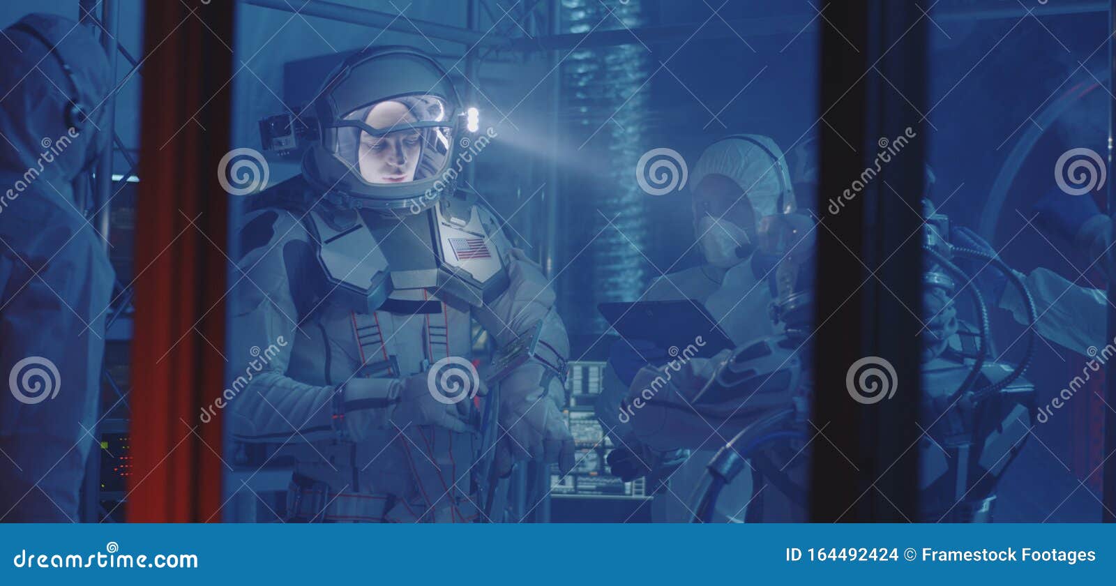 Astronauts Testing Spacesuit in Laboratory Stock Photo - Image of ...
