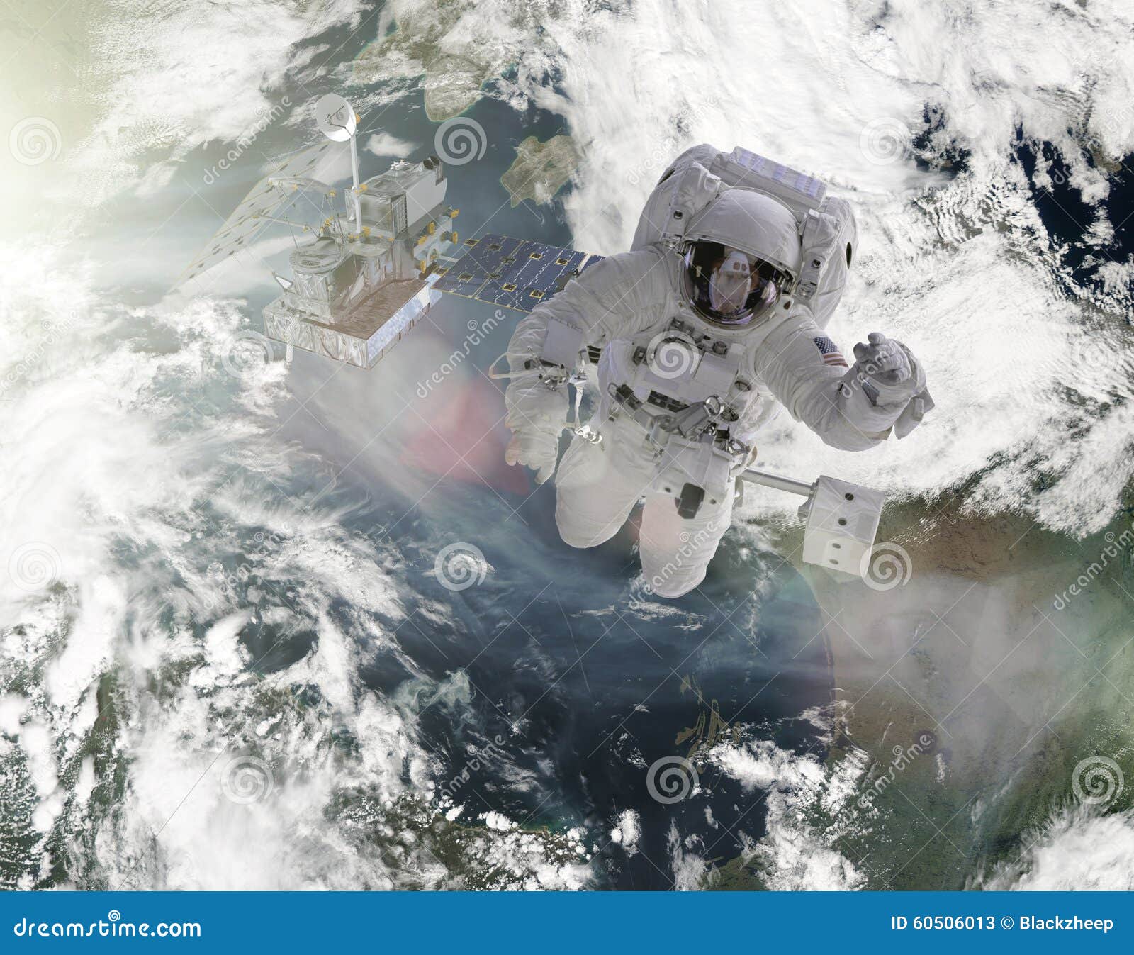 Astronauts Work on Satellite Elements of this Image Furnished by Nasa ...