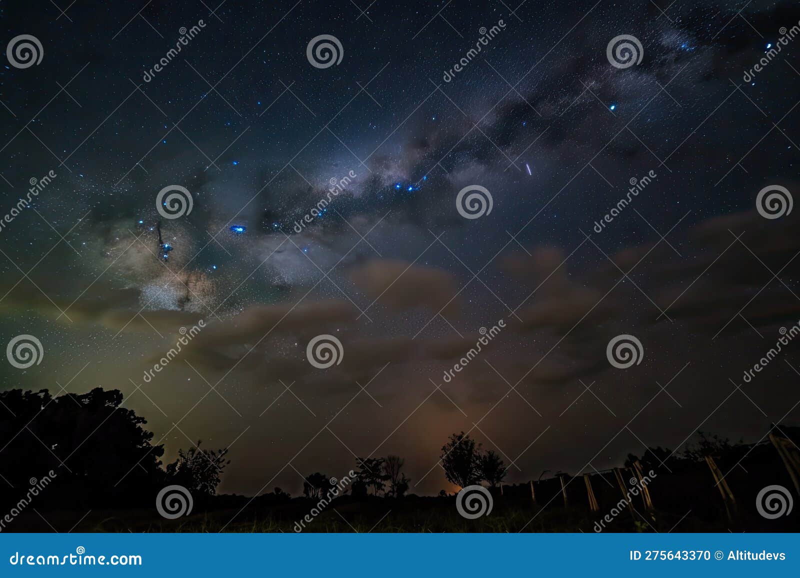 Astrophotography Of Starry Night Sky With Dramatic Clouds In The ...
