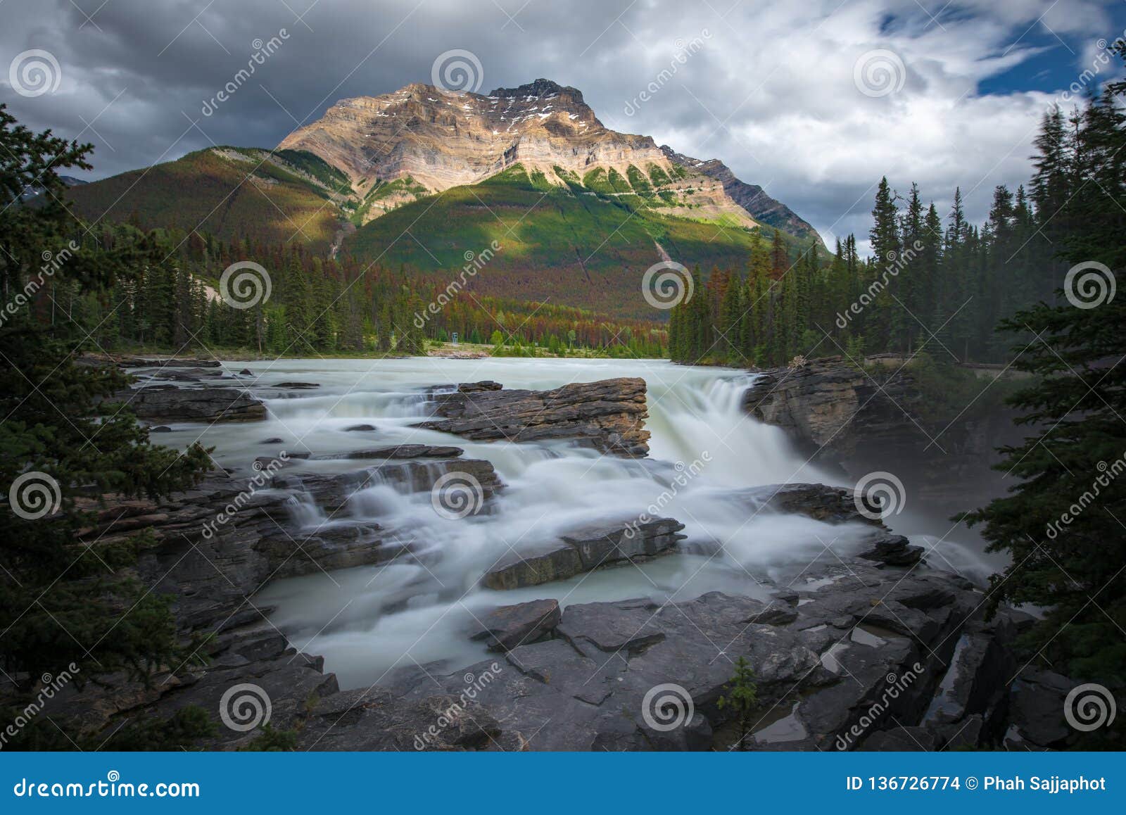 Athabasca Fall with Cloudy Day in Spring, Alberta, Canada Stock Photo ...