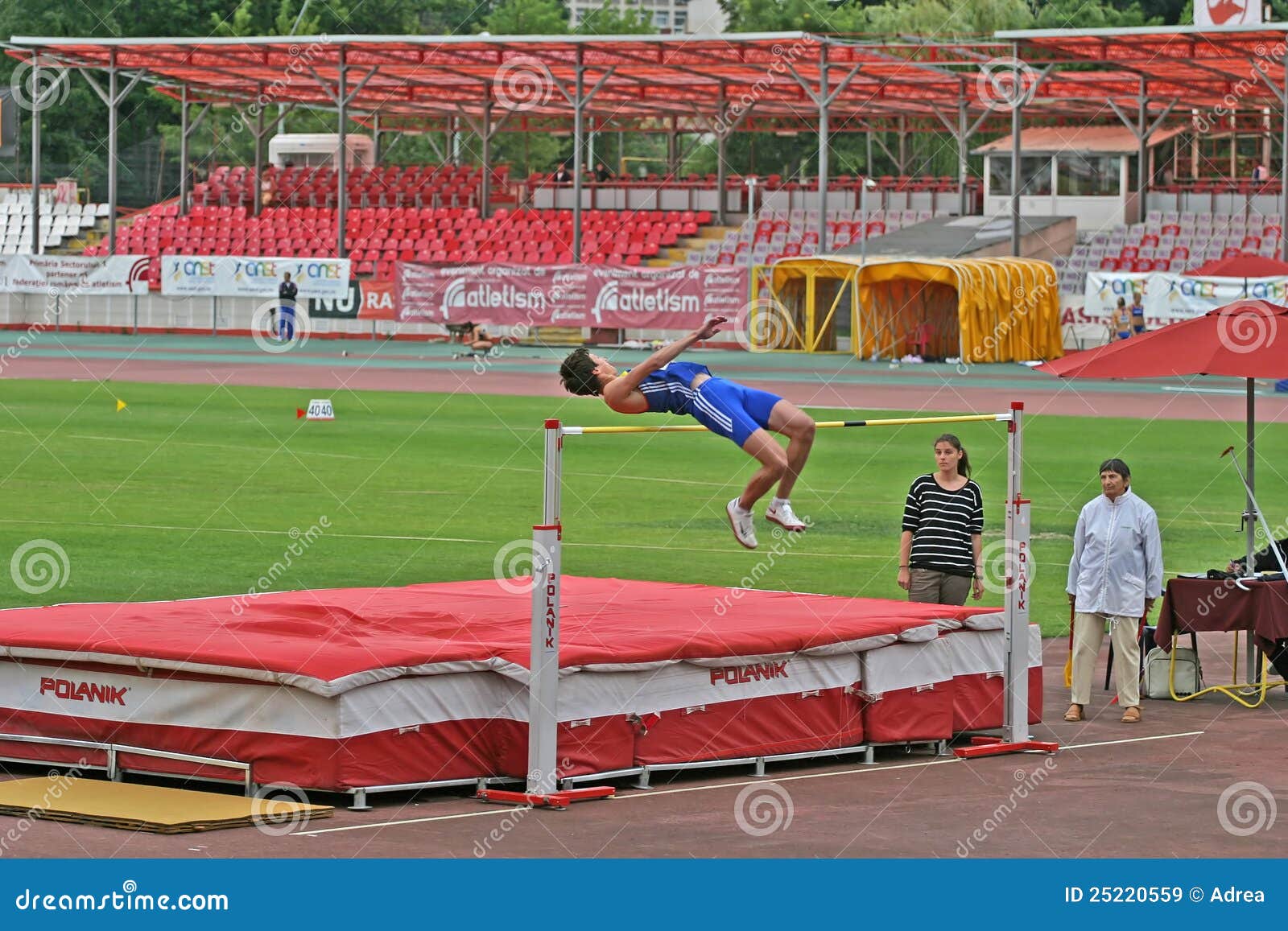 Athletes at high jump try editorial stock image. Image of muscular ...