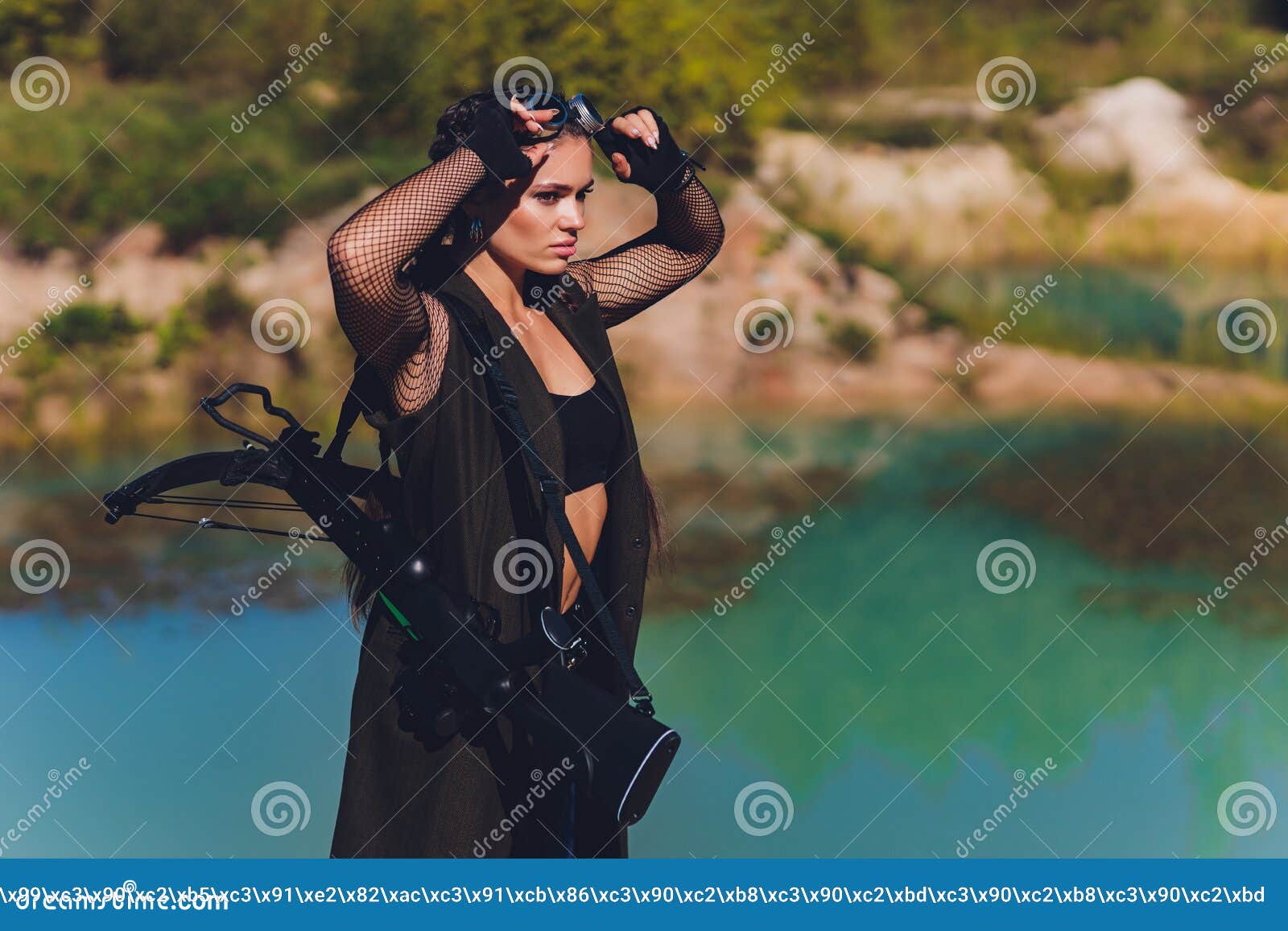 Athlete Aiming Young Woman Holding the Crossbow. Stock Image - Image of ...