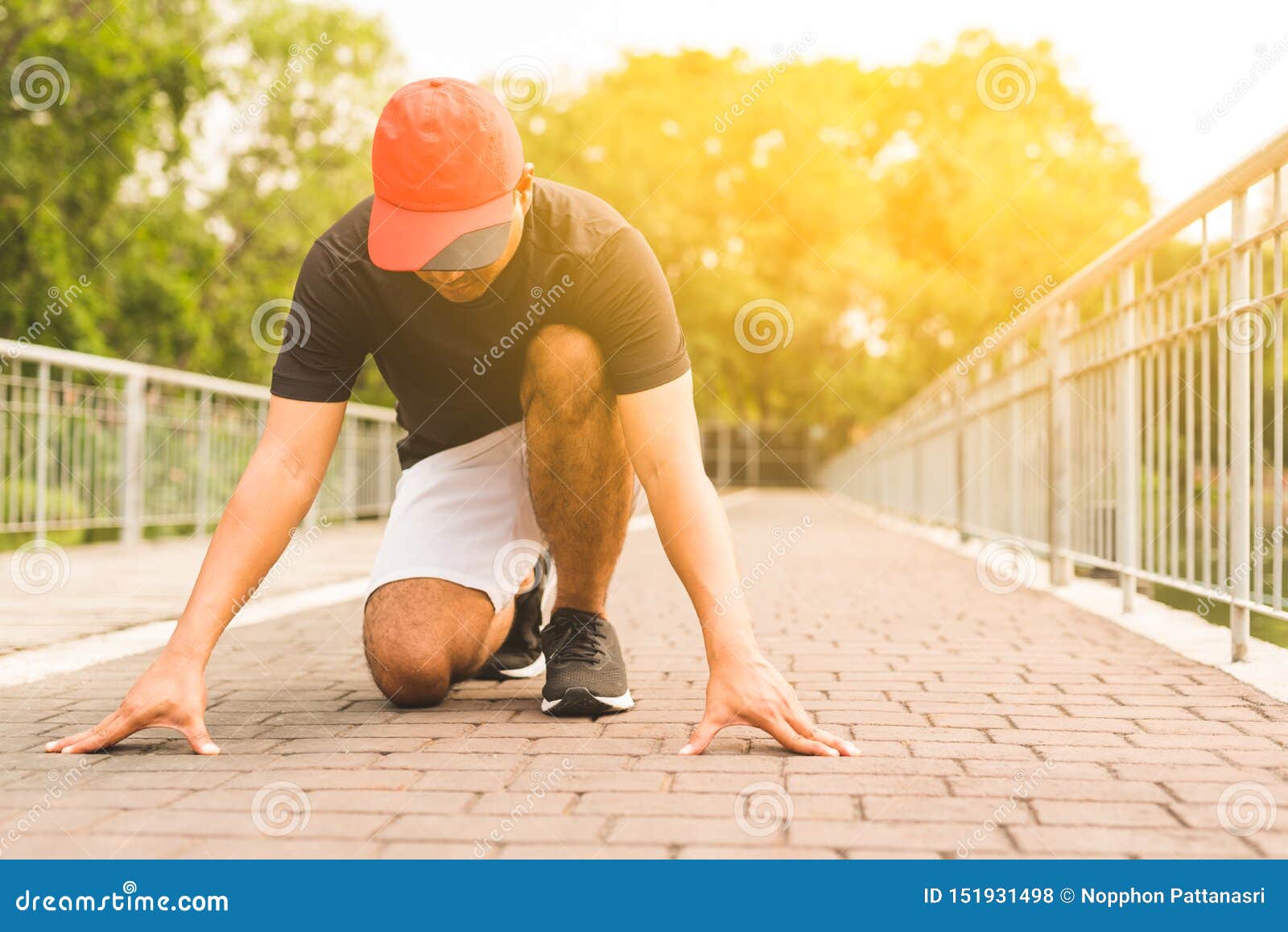 Athlete Man in Running Start Pose Stock Photo - Image of adult, care ...