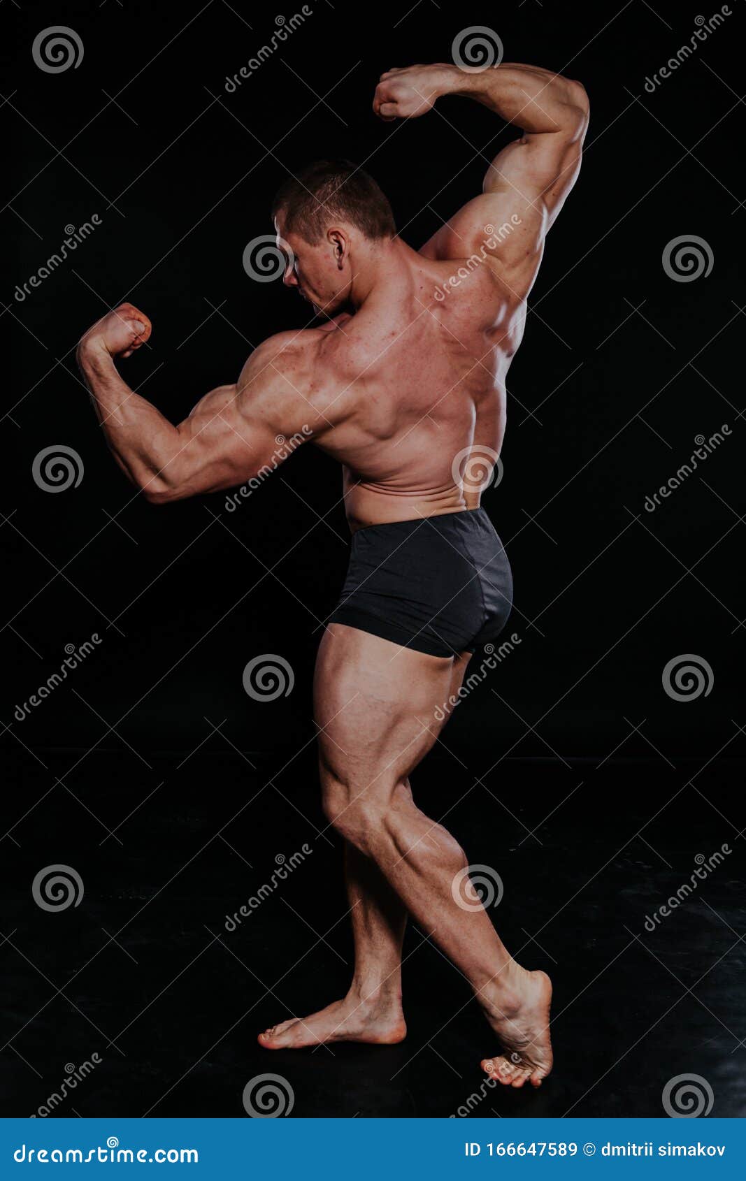 The Athlete Bodybuilder Shows His Muscles after Sports Stock Image ...