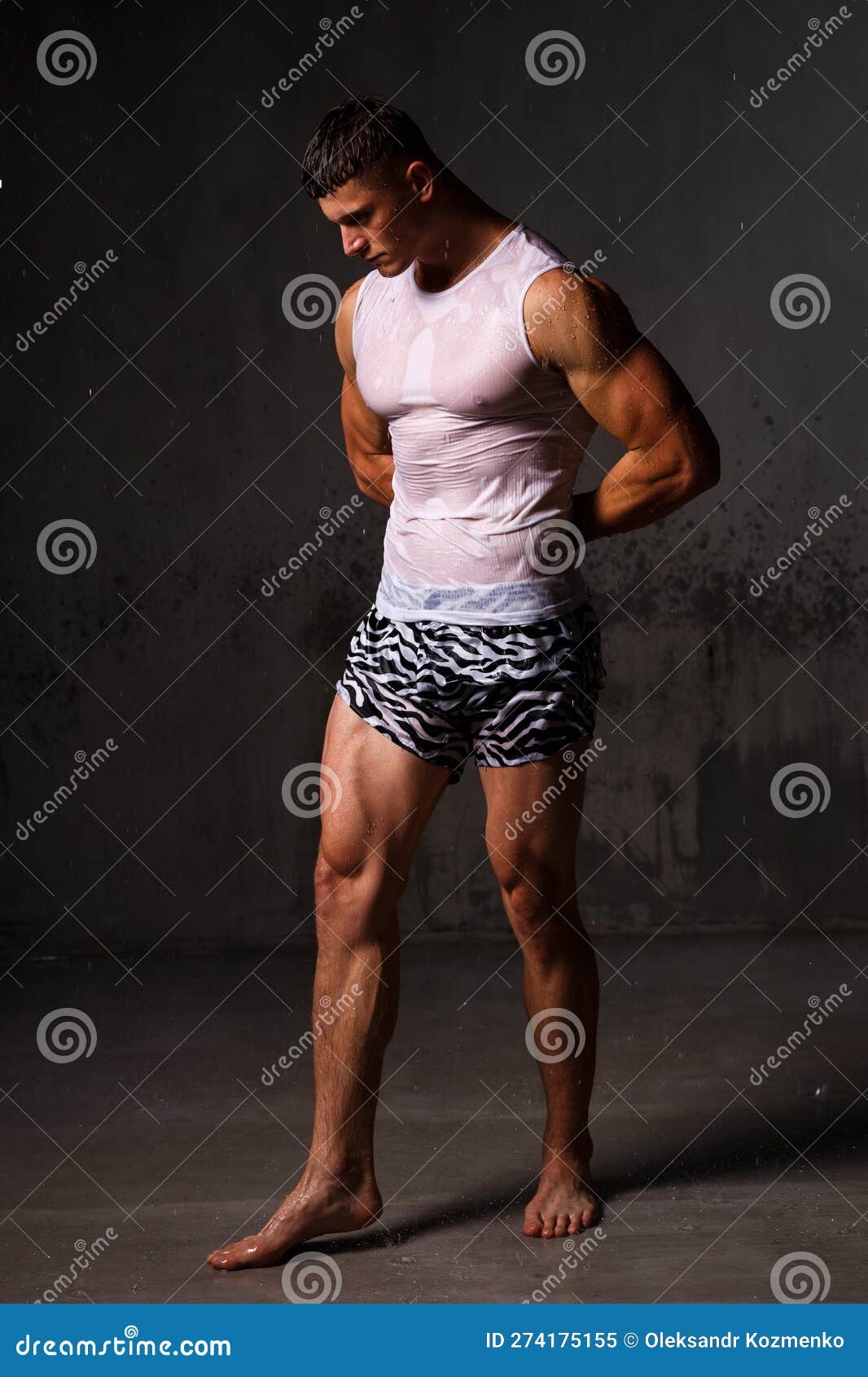 Athlete Bodybuilder Trains in the Studio in the Rain. Stock Image ...