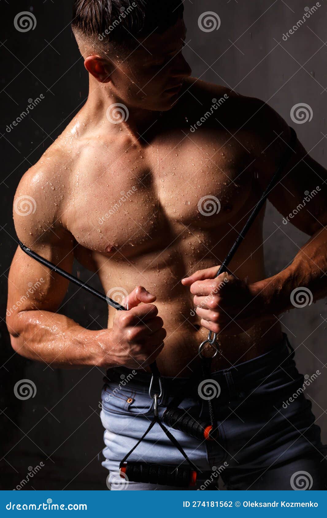 Athlete Bodybuilder Trains in the Studio in the Rain. Stock Photo ...