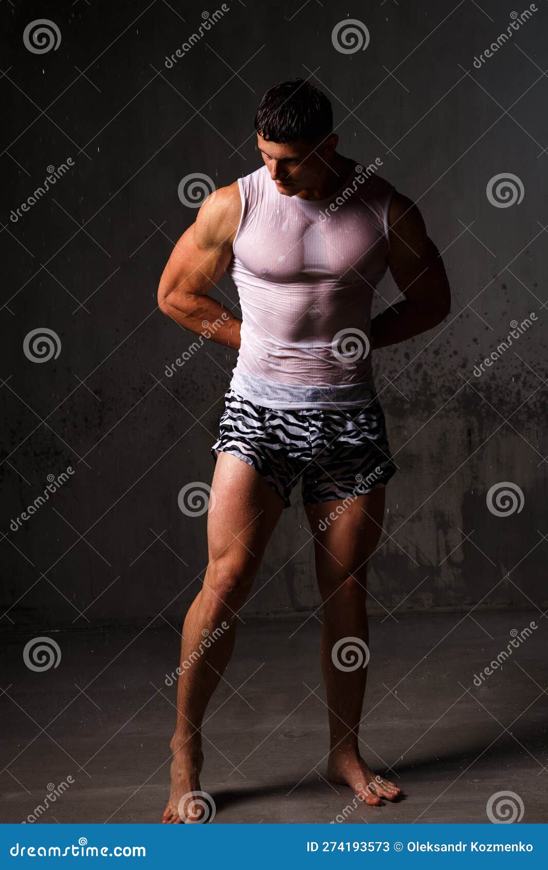Athlete Bodybuilder Trains in the Studio in the Rain. Stock Image ...