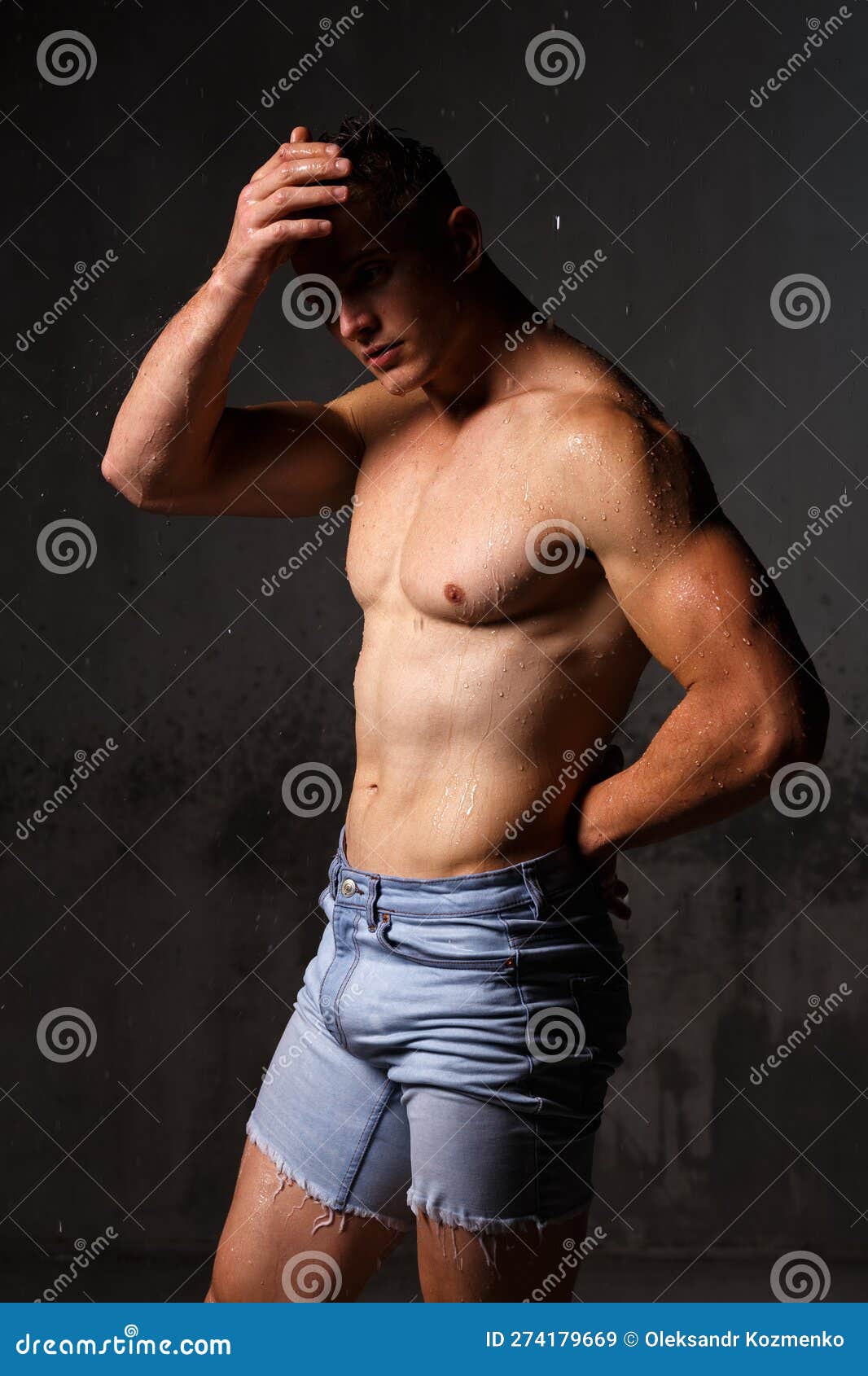 Athlete Bodybuilder Trains in the Studio in the Rain. Stock Image ...