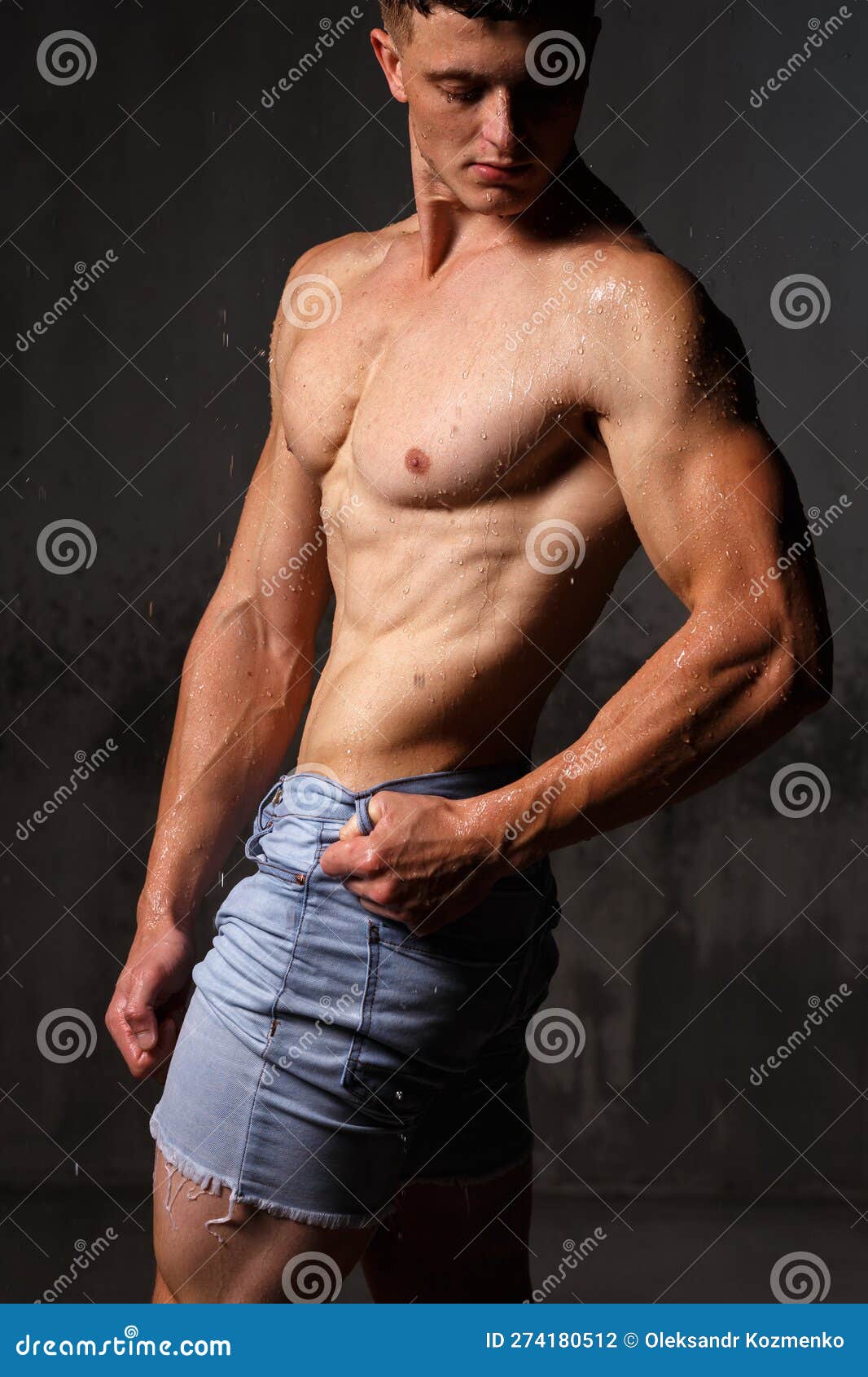 Athlete Bodybuilder Trains in the Studio in the Rain. Stock Photo ...