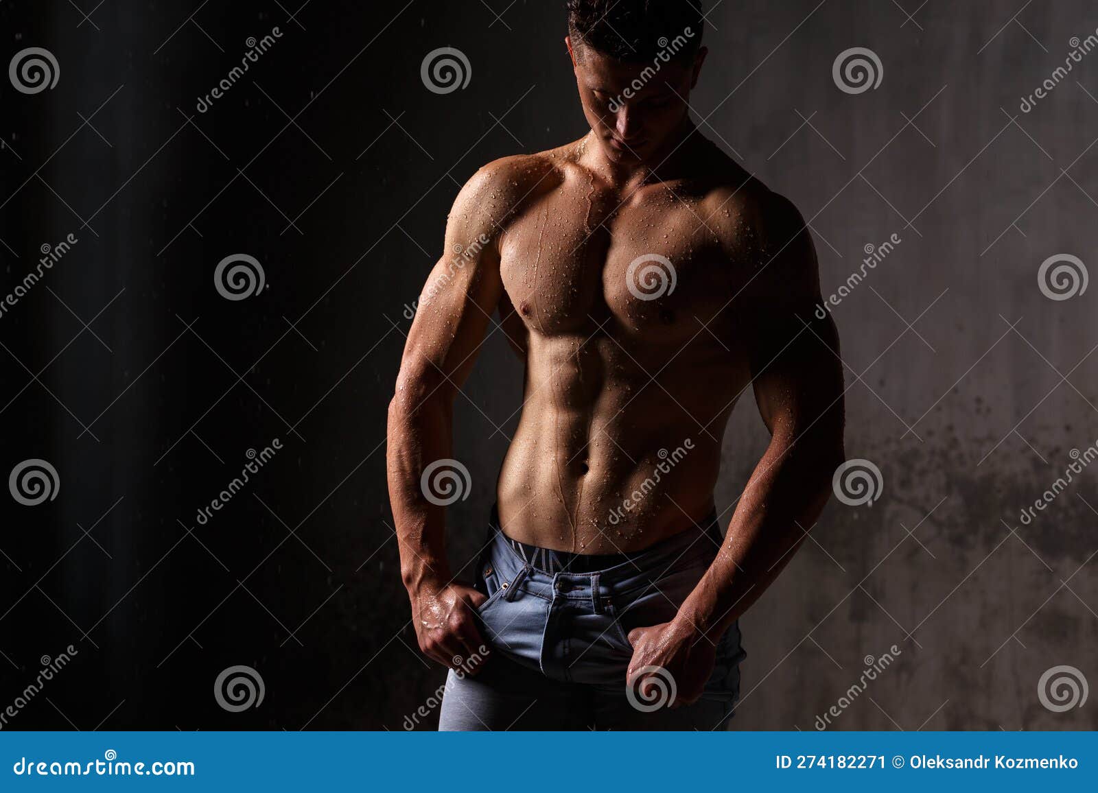 Athlete Bodybuilder Trains in the Studio in the Rain. Stock Image ...