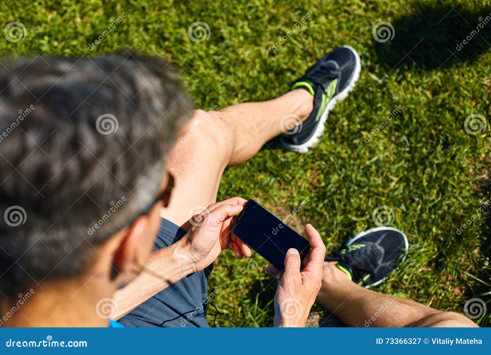 Athlete with Bottle of Water and Mobile Phone Stock Image - Image of ...