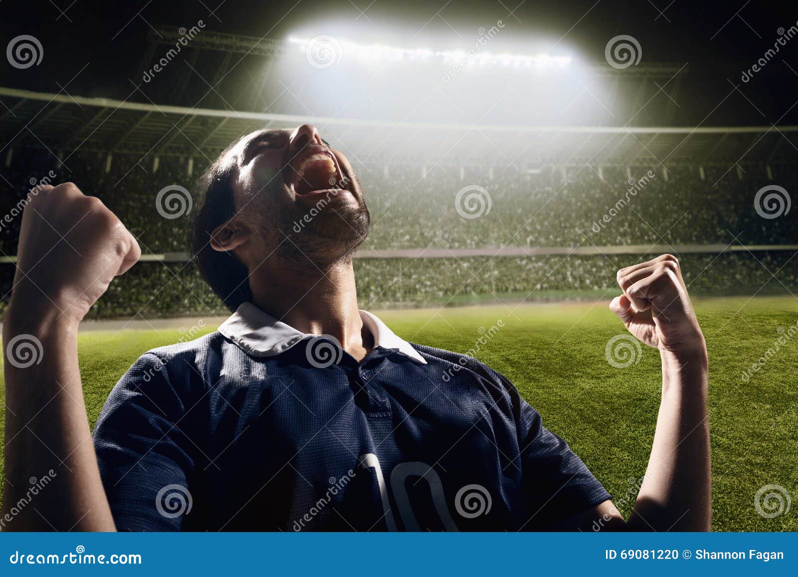Athlete Cheering in Lights at Night Stock Photo - Image of hero ...