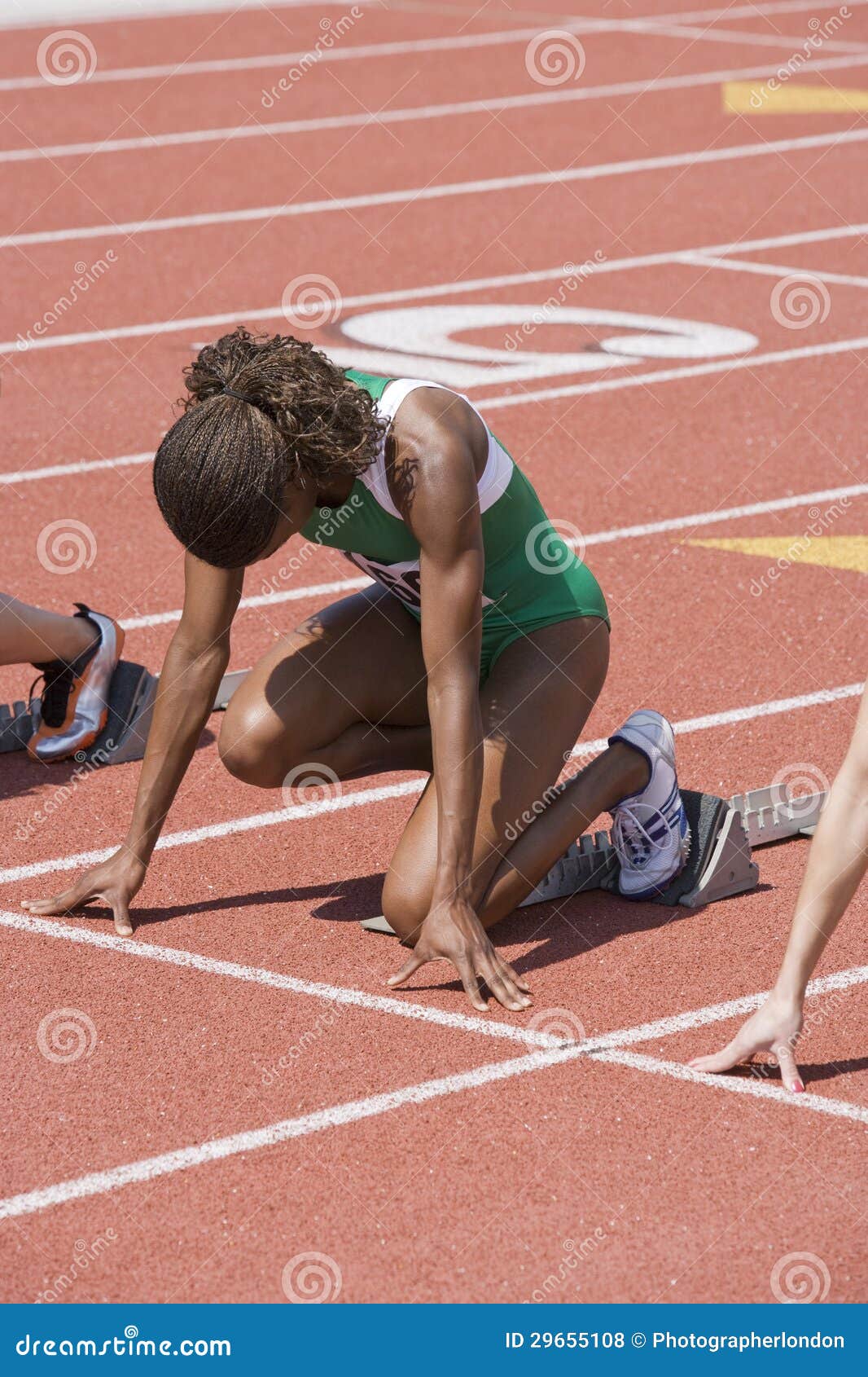 Athlete with Competitors at Starting Line Stock Photo - Image of person ...