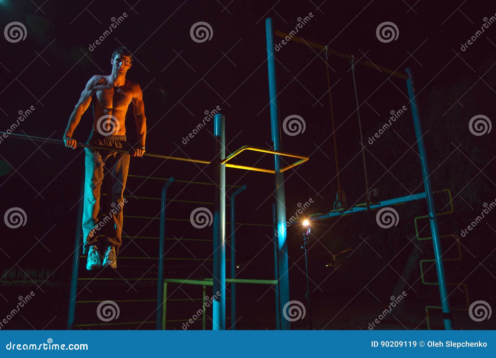 Athlete Doing Exercises on the Horizontal Bar Stock Image - Image of ...