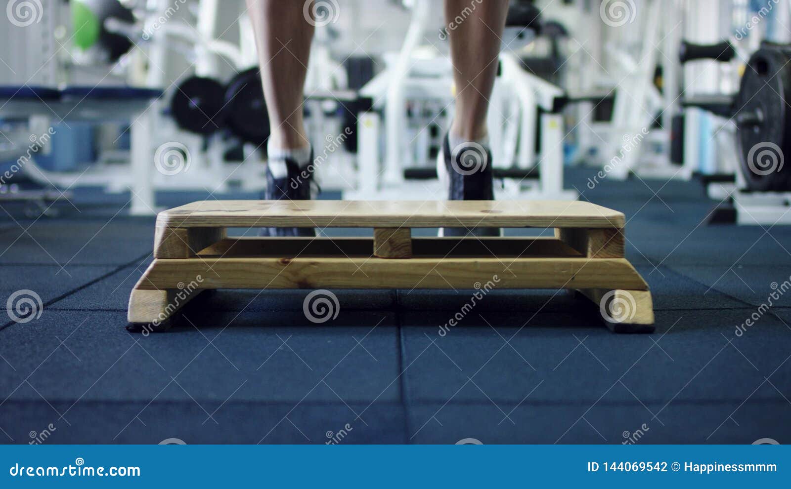 Athlete Doing Jump Exercises with Step Board in a Gym Stock Footage ...