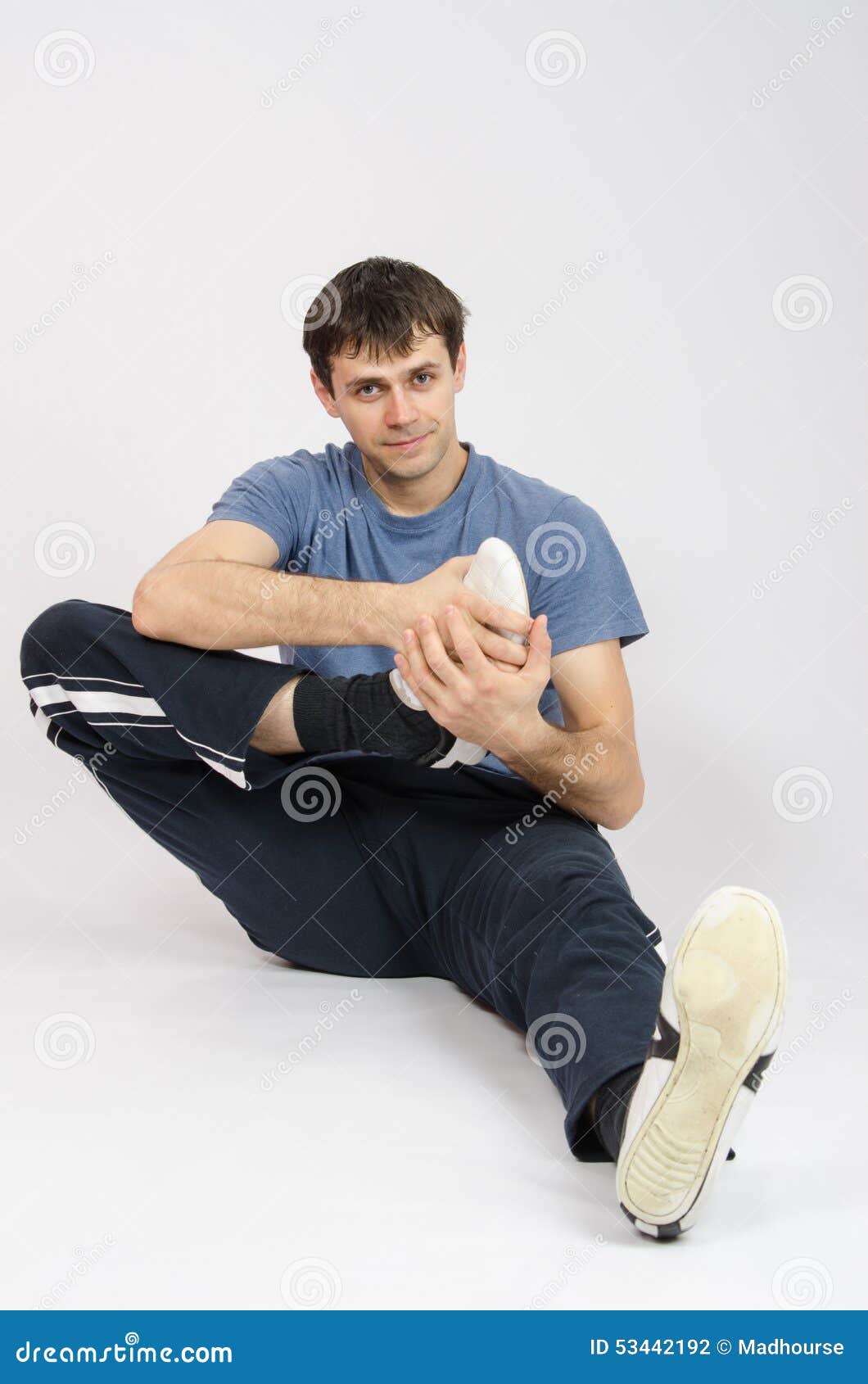 Athlete Flexing the Foot of Right Leg Stock Photo - Image of body ...