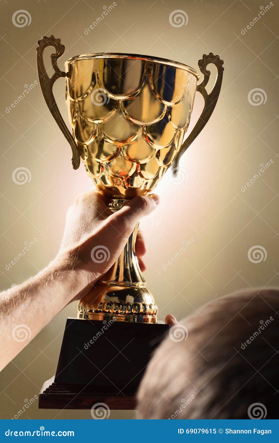 Athlete Holding Trophy Cup at Night Stock Image - Image of light ...