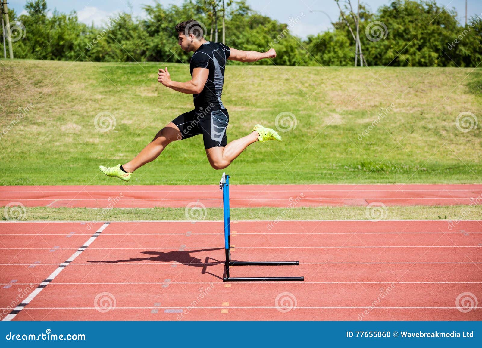 Athlete Jumping Above the Hurdle Stock Photo - Image of outdoors ...
