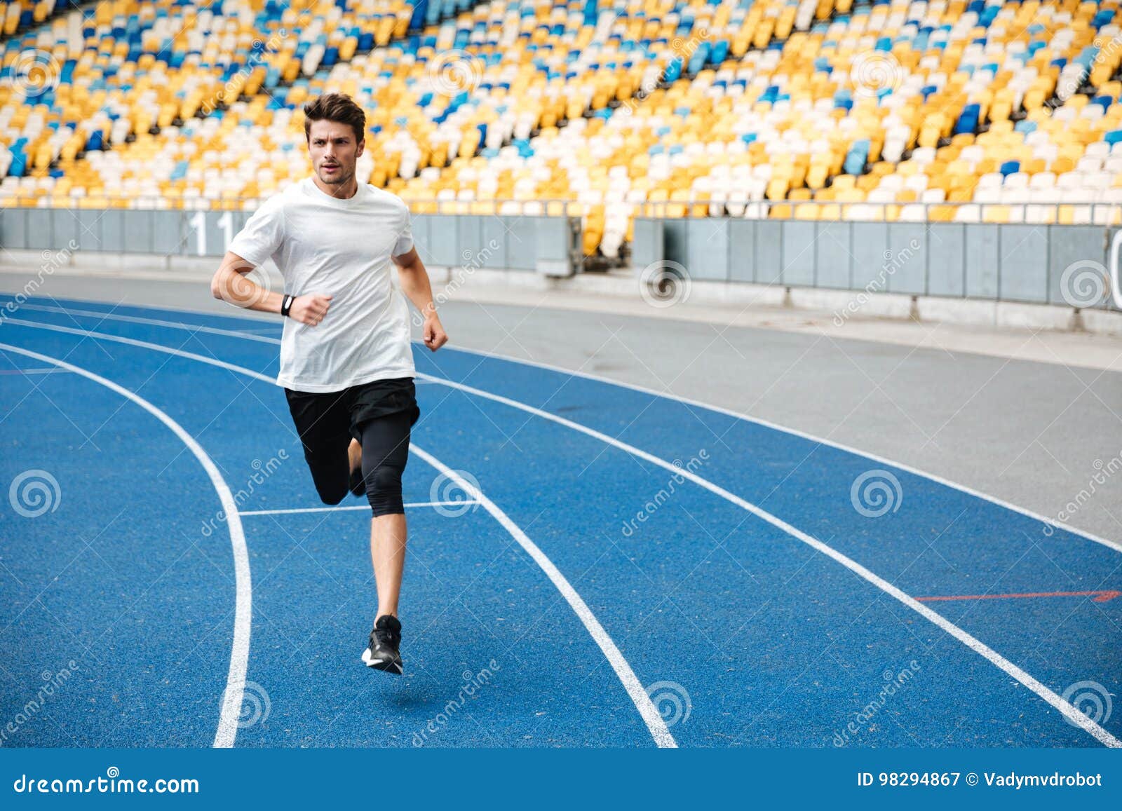 Athlete Man Running on a Racetrack Stock Image - Image of motion ...