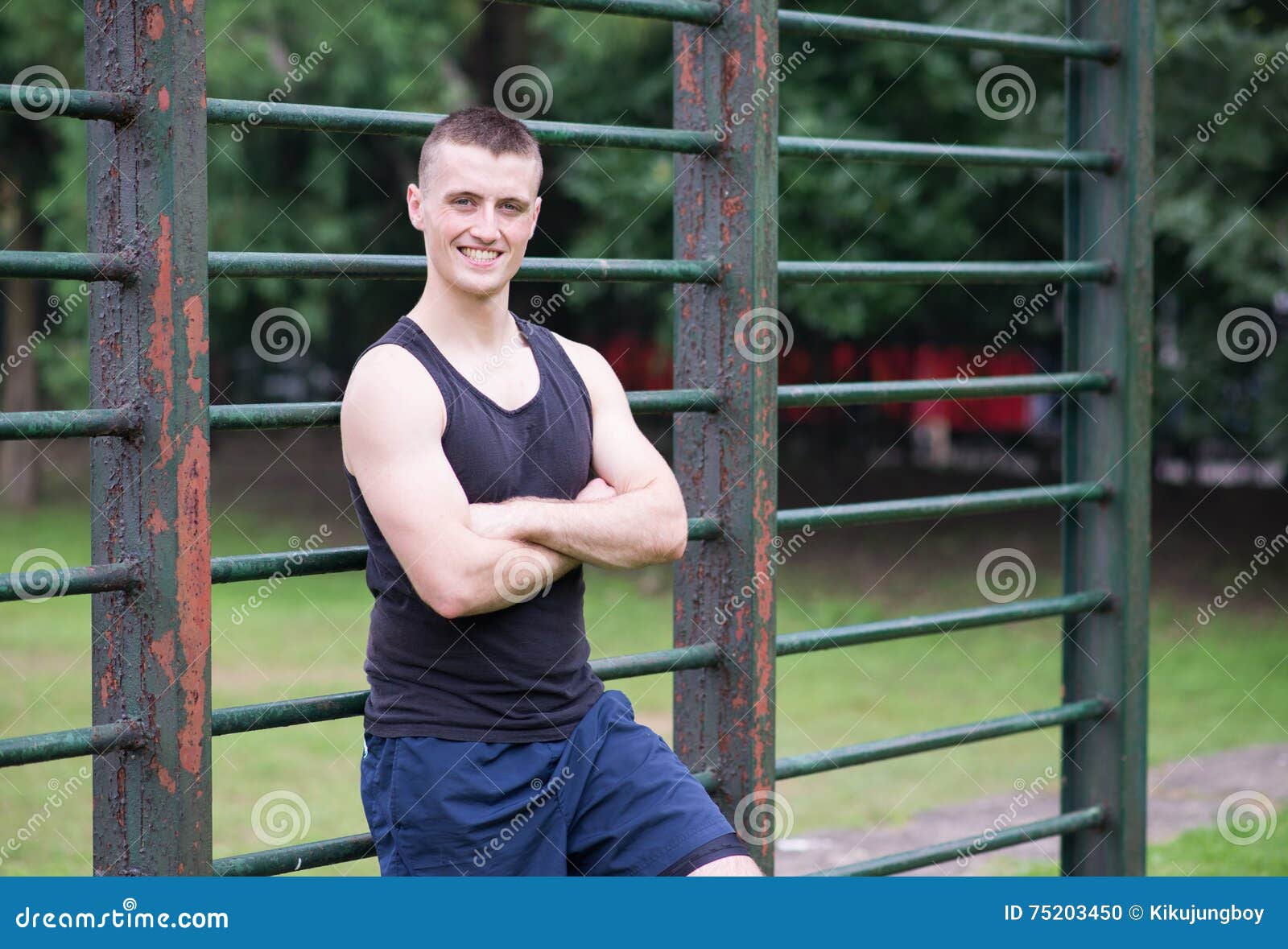 Athlete man standing stock photo. Image of outdoors, muscular - 75203450