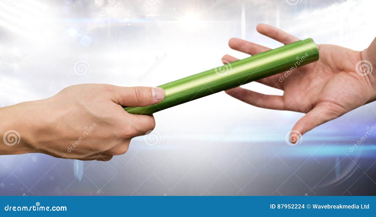 Athlete Passing Baton Against Digitally Generated Background Stock ...