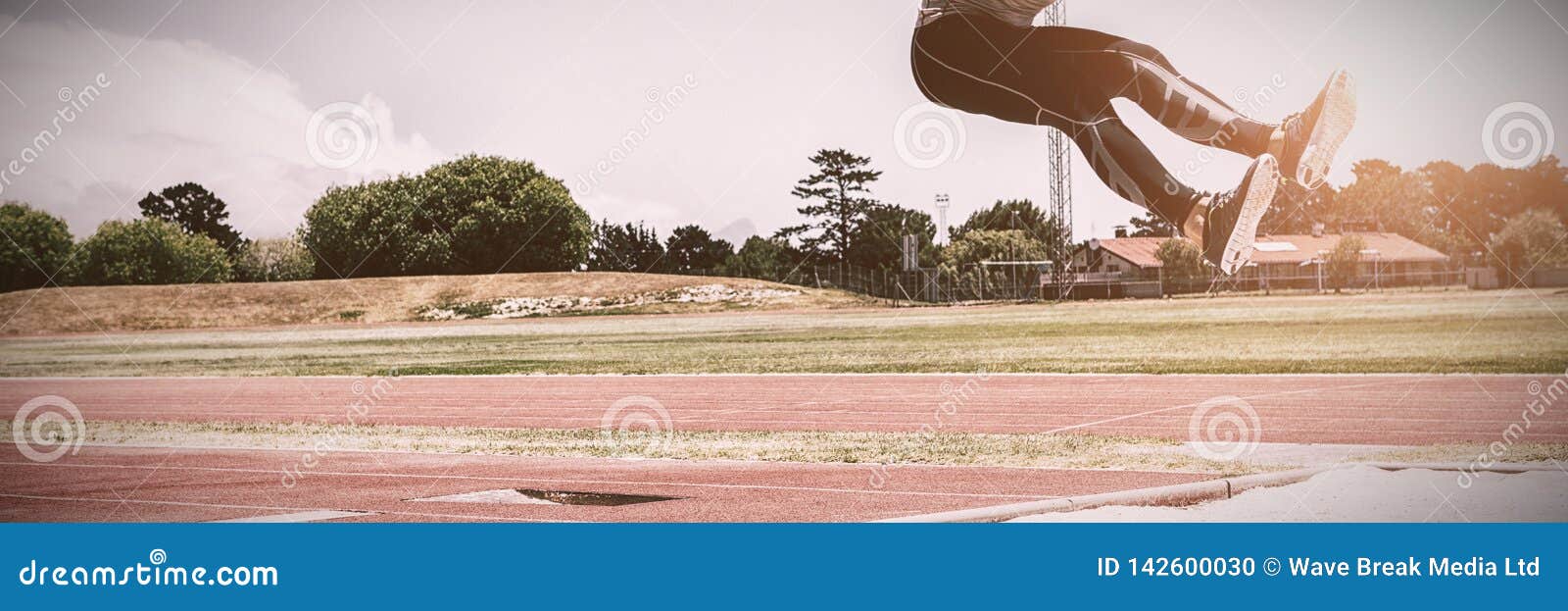 Athlete Performing a Long Jump Stock Photo - Image of sportsman ...