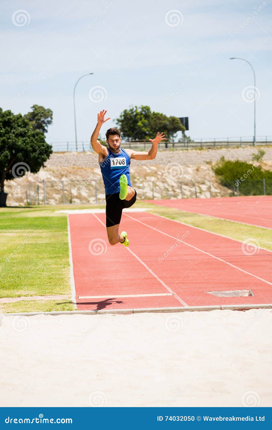 Athlete Performing a Long Jump Stock Photo - Image of speed, vitality ...