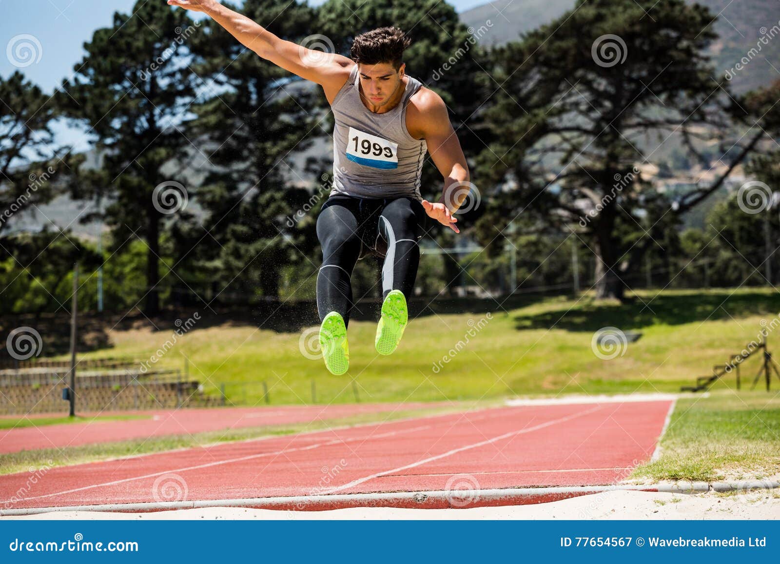 Athlete Performing a Long Jump Stock Image - Image of strength, olympic ...