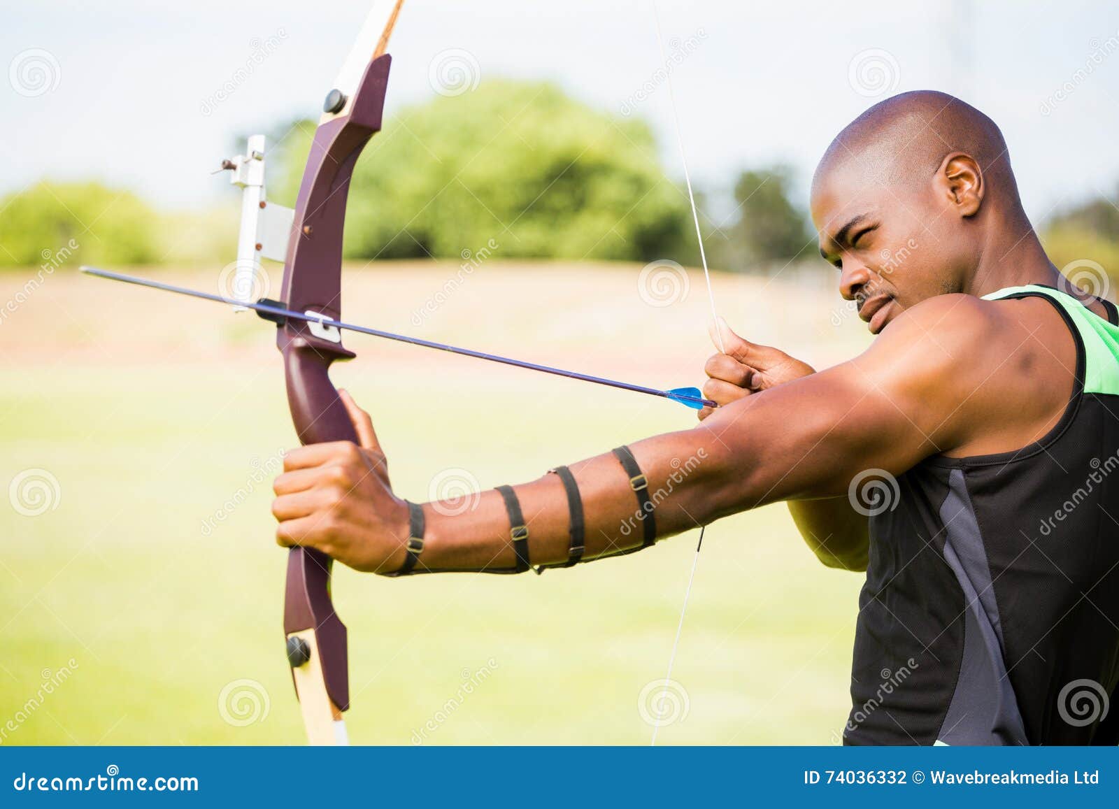 Athlete practicing archery stock photo. Image of archery - 74036332