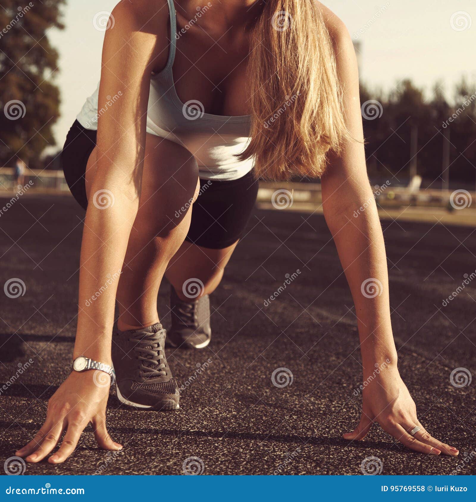 Beautiful Athlete on a Race Track is Ready To Run Stock Photo - Image ...