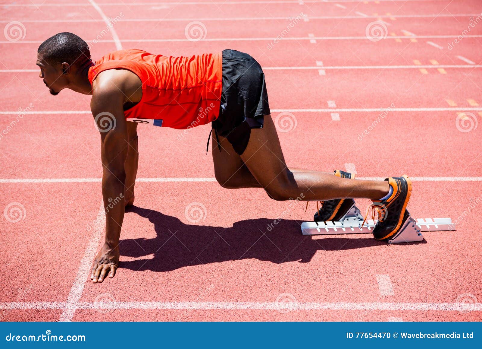 Athlete ready to run stock photo. Image of olympics, male - 77654470