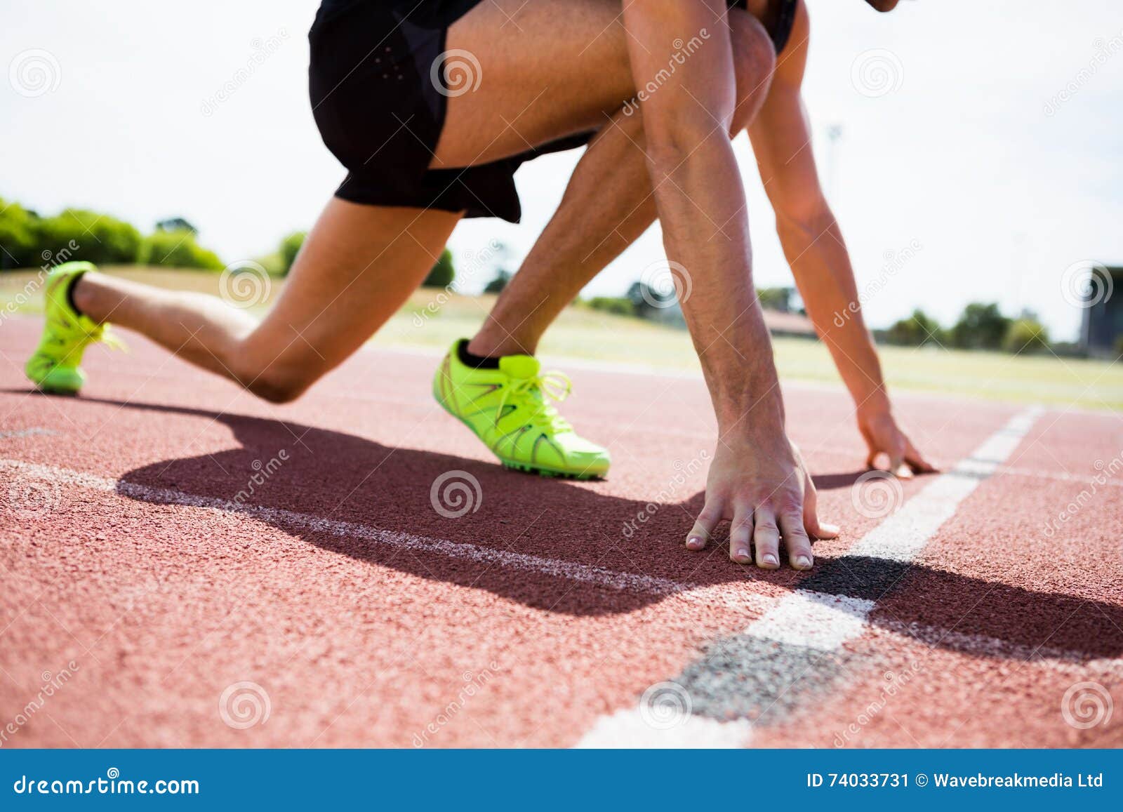 Athlete ready to run stock image. Image of person, kneeling - 74033731
