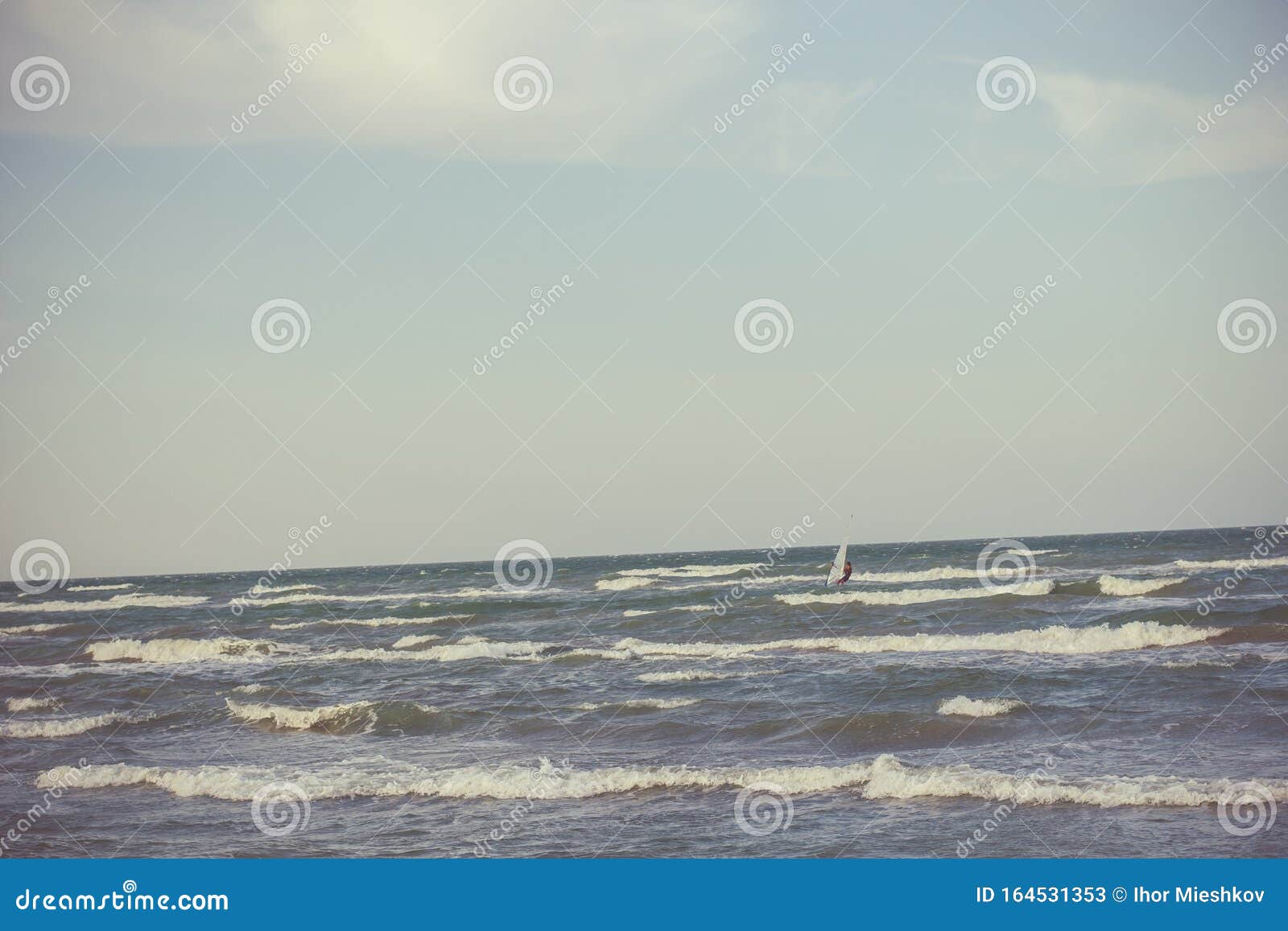 Athlete Rides a Sailing Board at Sea in a Storm Stock Image - Image of ...