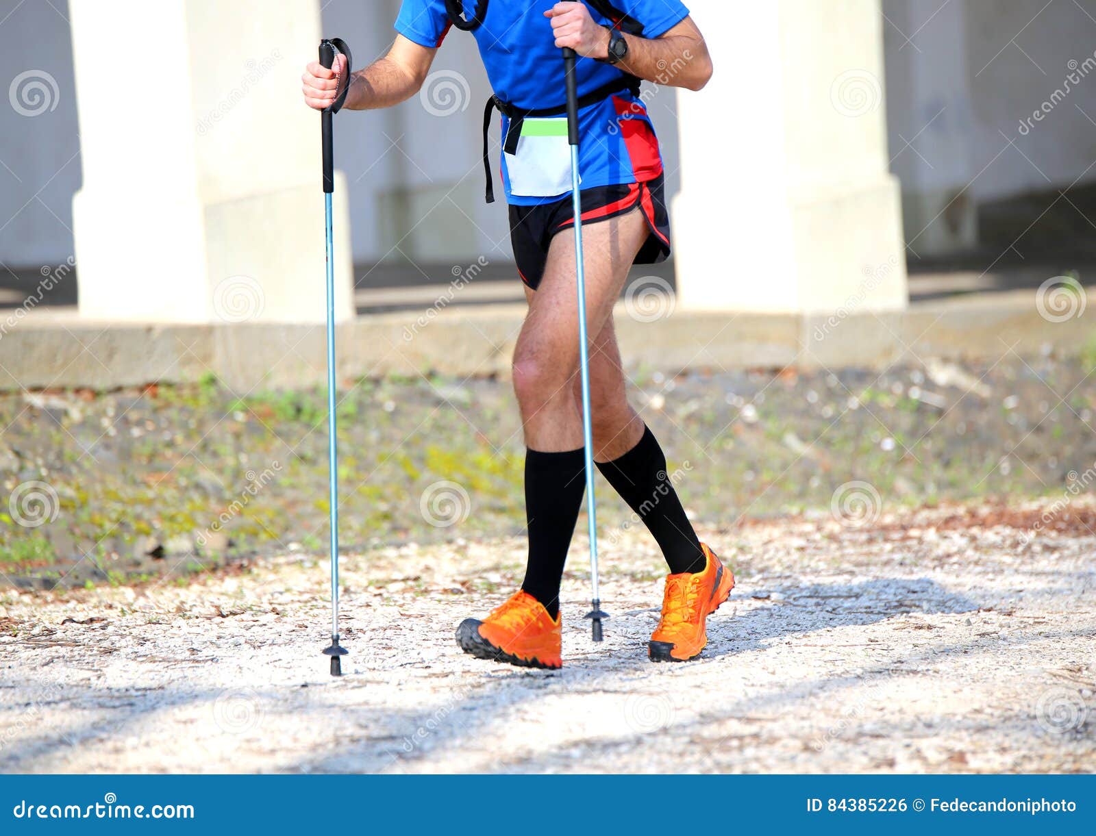 Athlete Runner during the Nordic Walking Training with the Nordi Stock ...