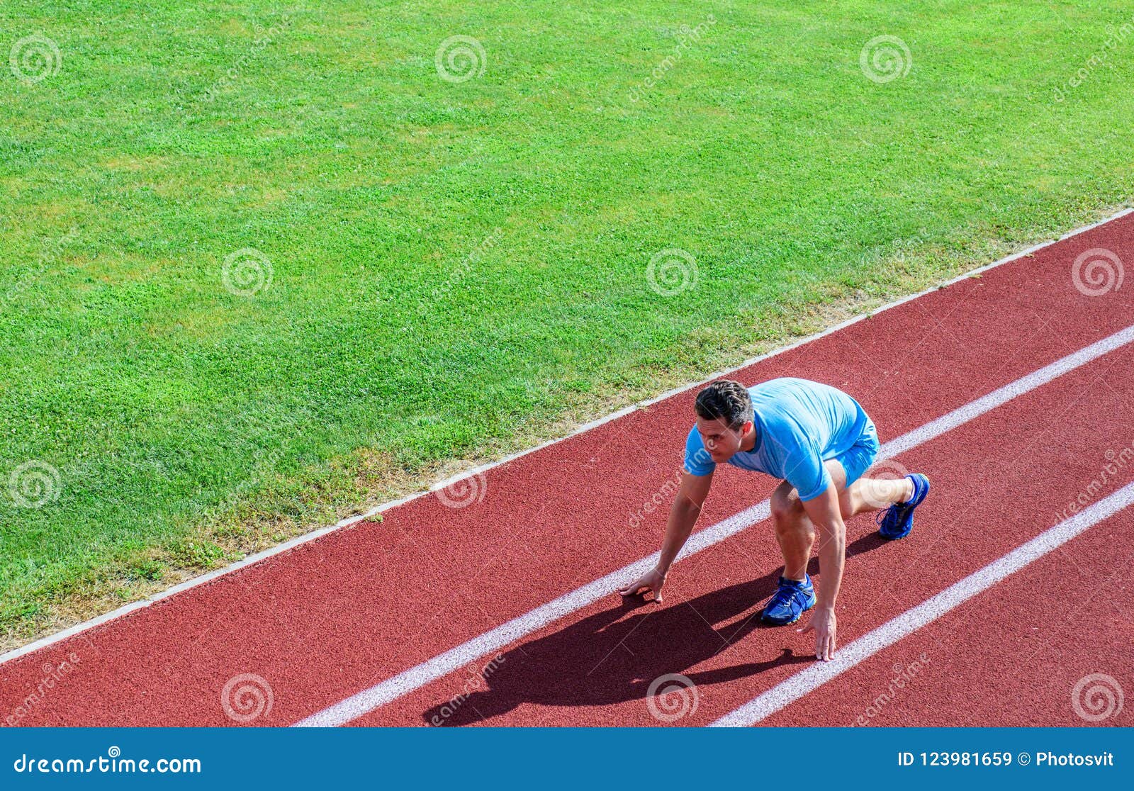 Athlete Runner Prepare To Race. Joint Mobility Exercises To Improve ...