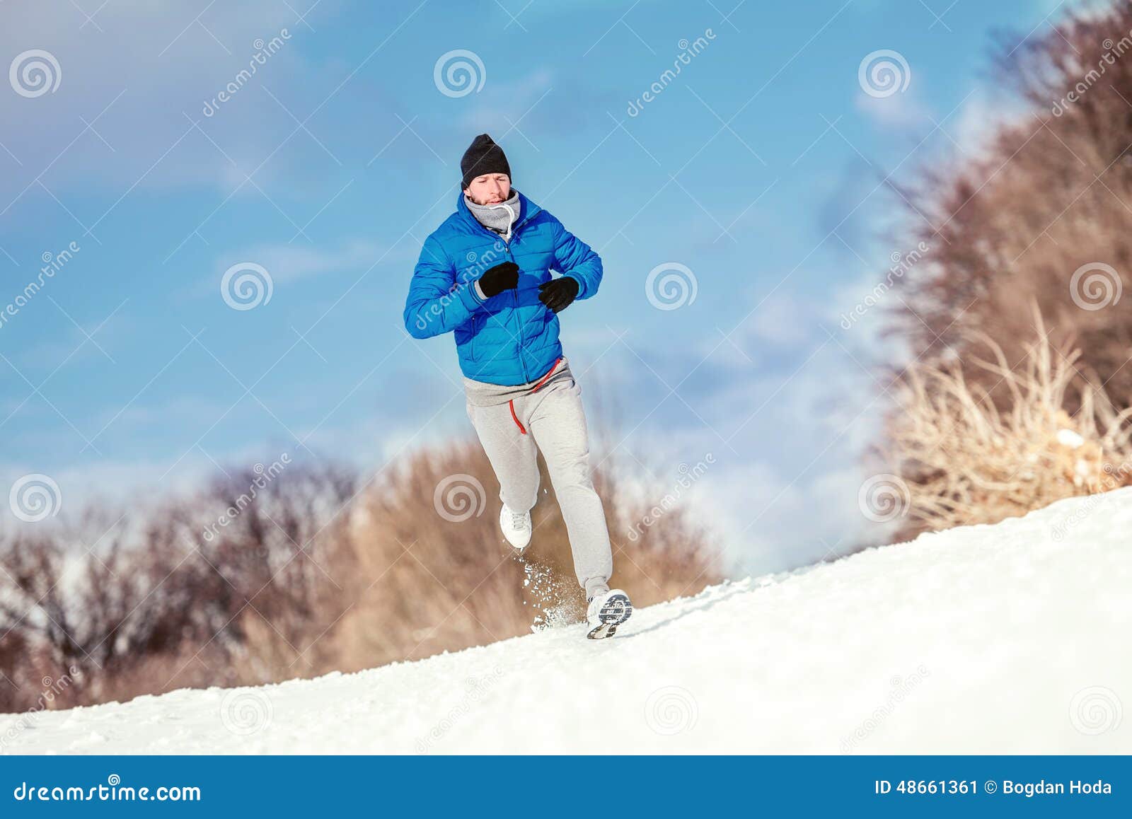 Athlete Running on Snow, Preparing for Hard Training and Workout Stock ...