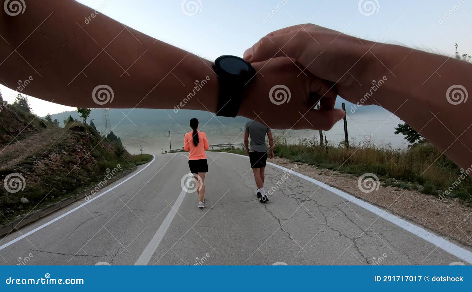 Athlete Setting Up Smart Watch before Exercise. Multiethnic Group of ...