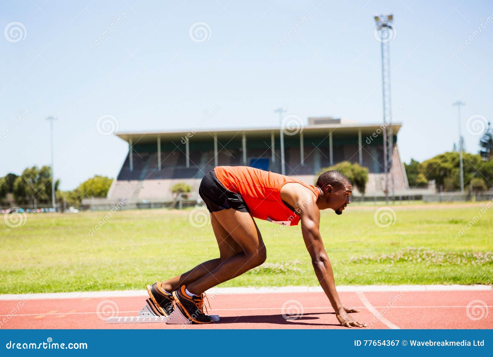 Athlete on a Starting Block about To Run Stock Image - Image of olympic ...