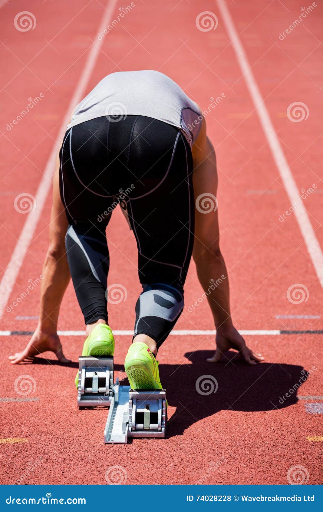 Athlete on a Starting Block about To Run Stock Photo - Image of sports ...