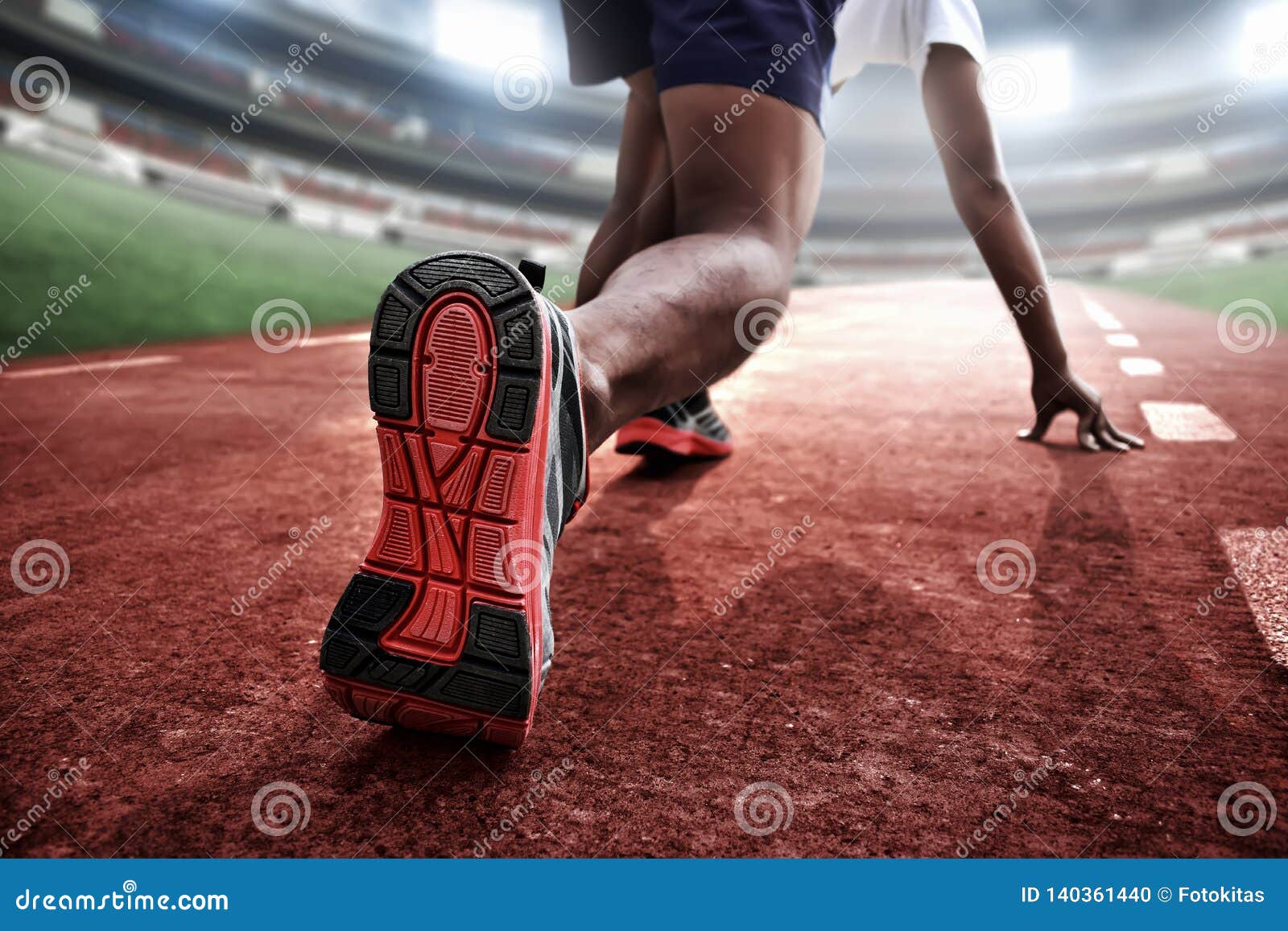 Athlete in Starting Position Ready To Run Stock Photo - Image of arena ...