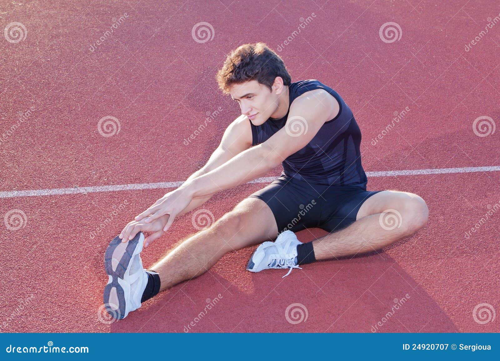Athlete stretching. stock image. Image of shoe, adult - 24920707