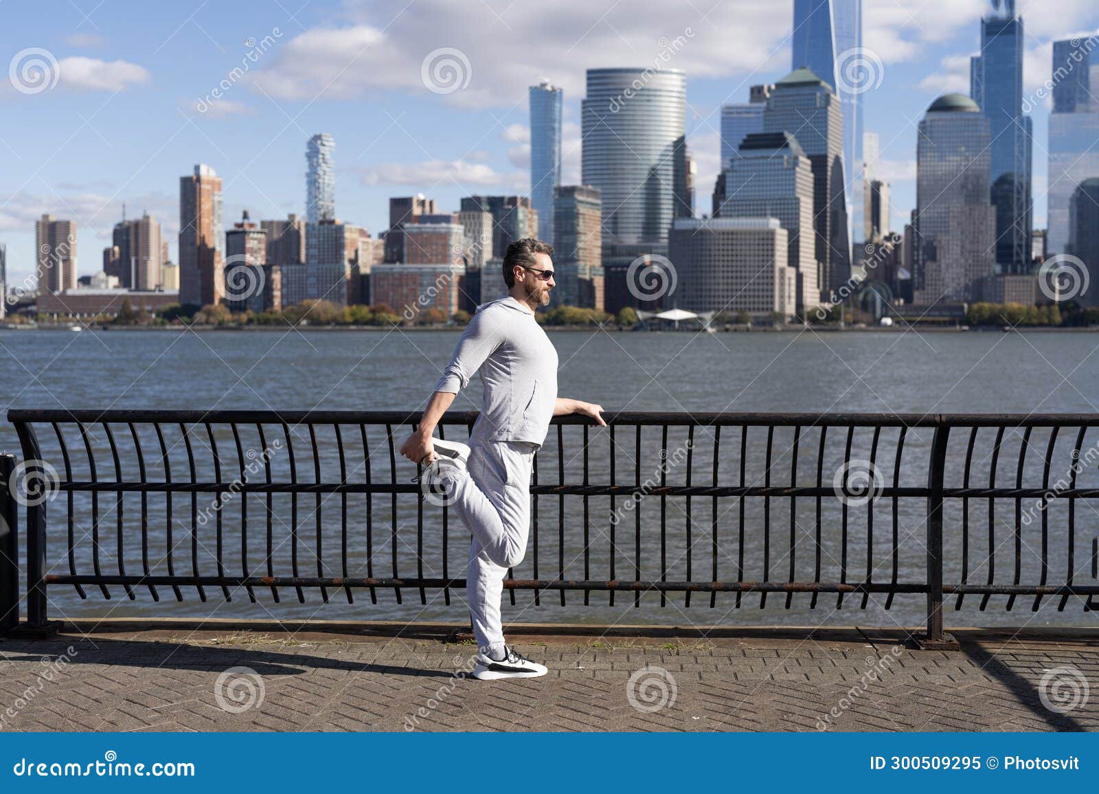 Athlete Stretching To Improve Flexibility. Athlete Stretching Muscles ...