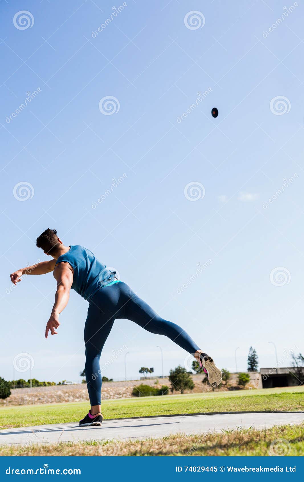 Athlete Throwing Discus in Stadium Stock Image - Image of stadium ...