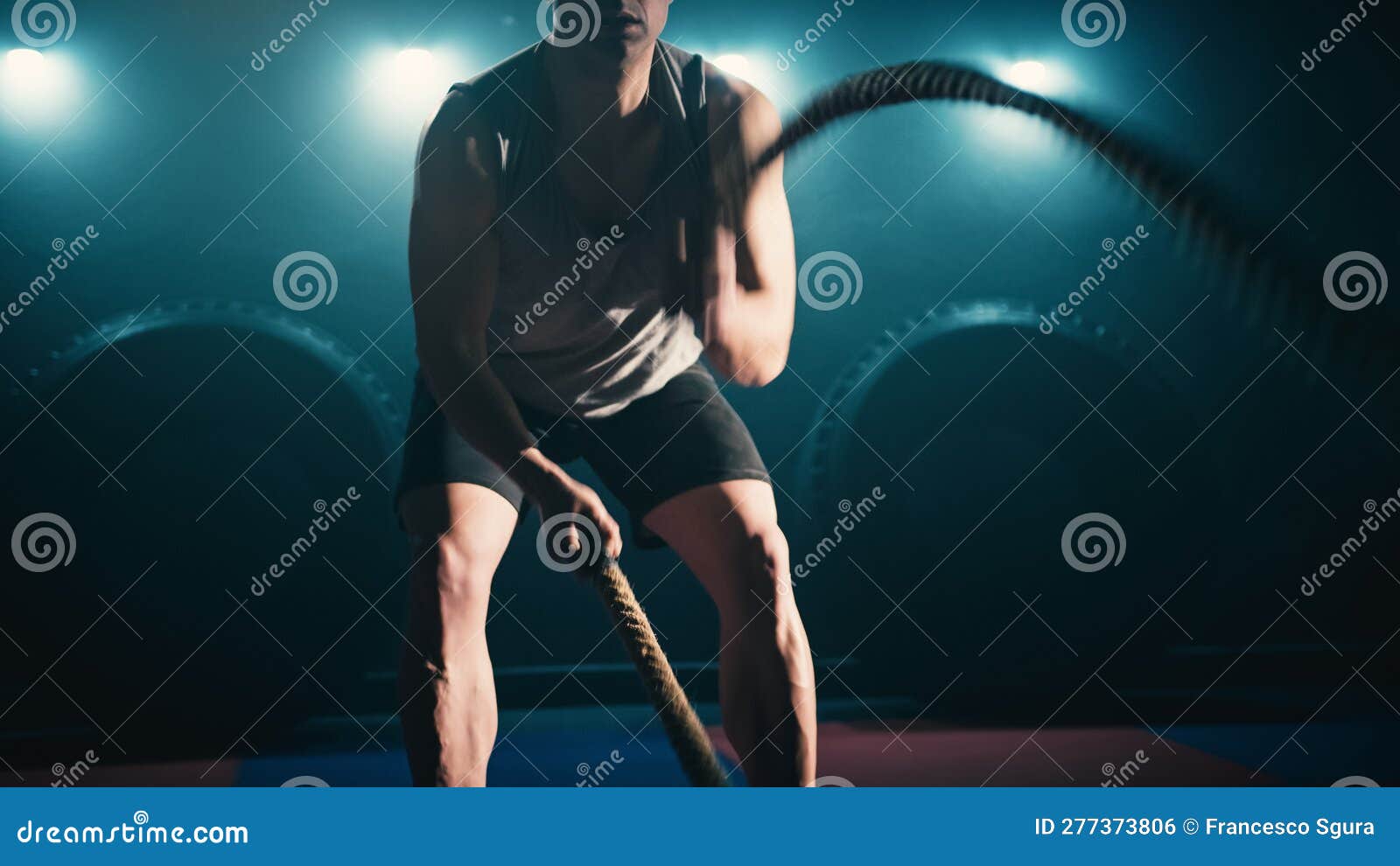 Athlete Training Using Battle Ropes Stock Photo - Image of strength ...