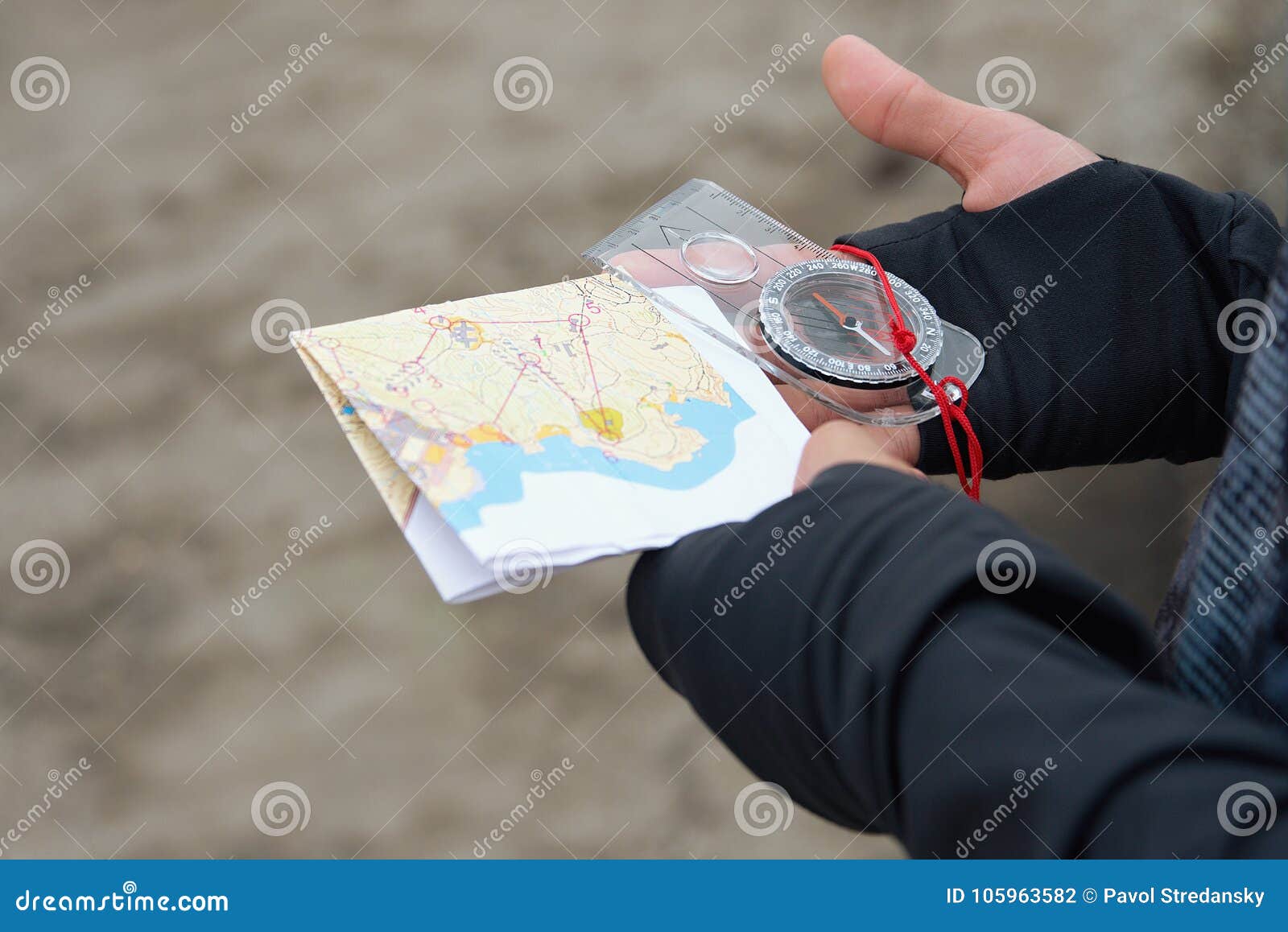 Athlete Uses Navigation Equipment for Orienteering,compass and ...